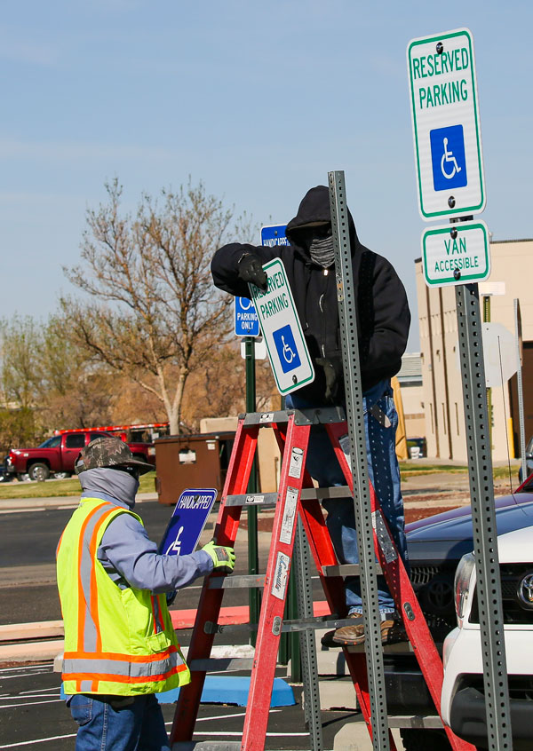 Labs shows respect with new accessible parking signs – LabNews